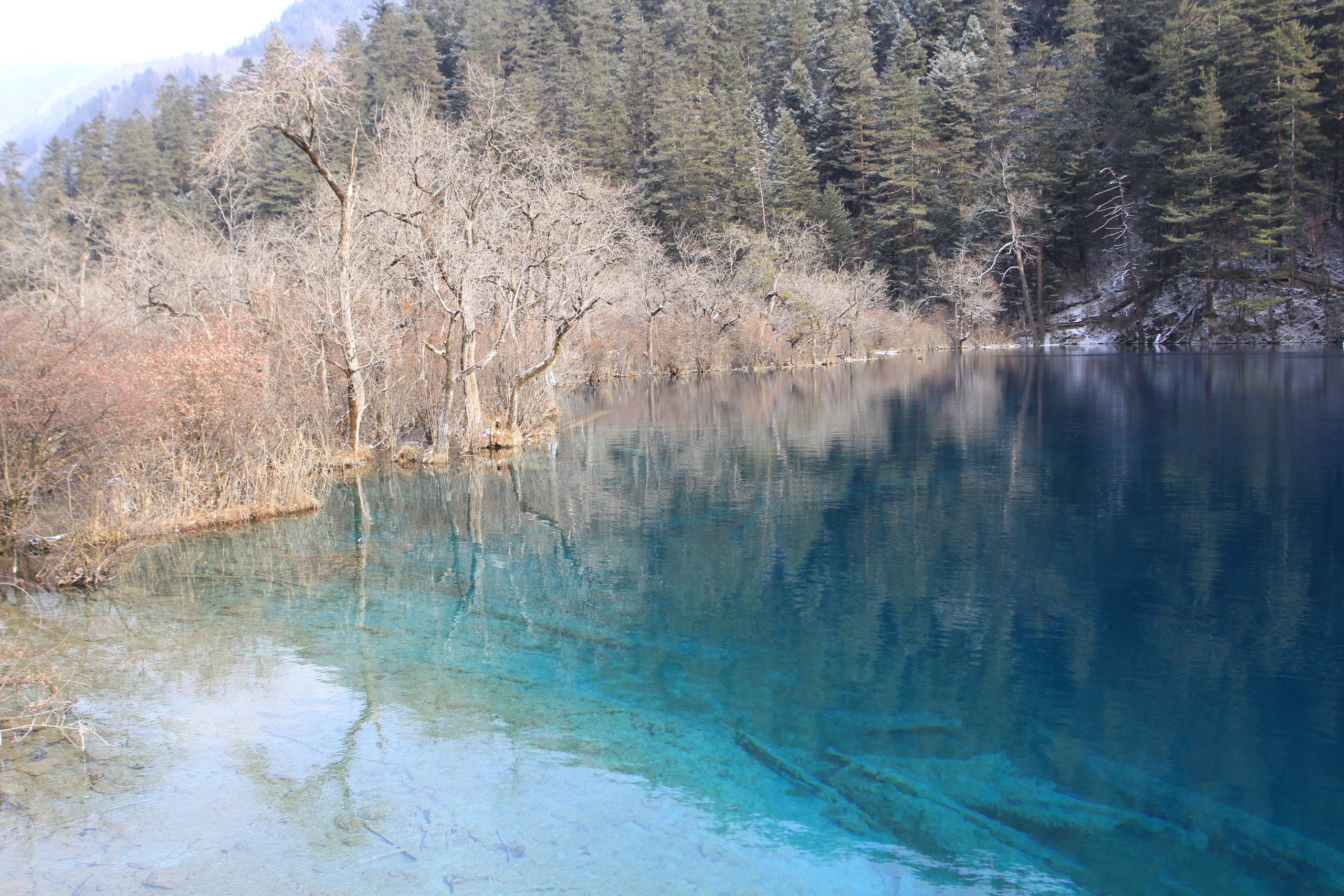 The surreal scenery of Jiuzhaigou during the snowy season.